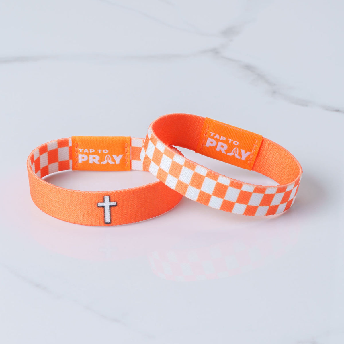 Tap To Pray® Wristband – Orange & White Checkers — VERSIBLE